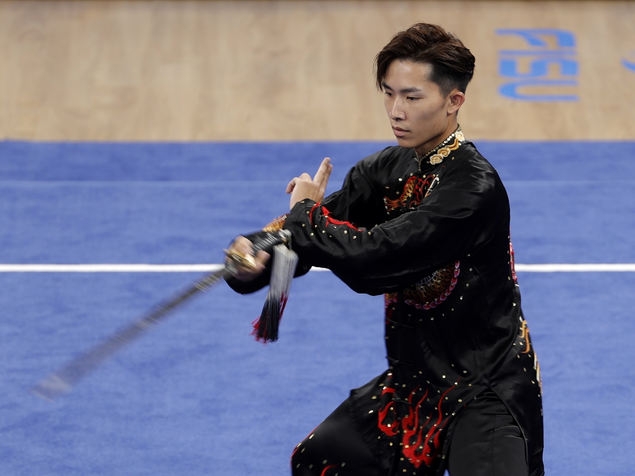 Samuel Hui wins first gold for HK in university games - RTHK